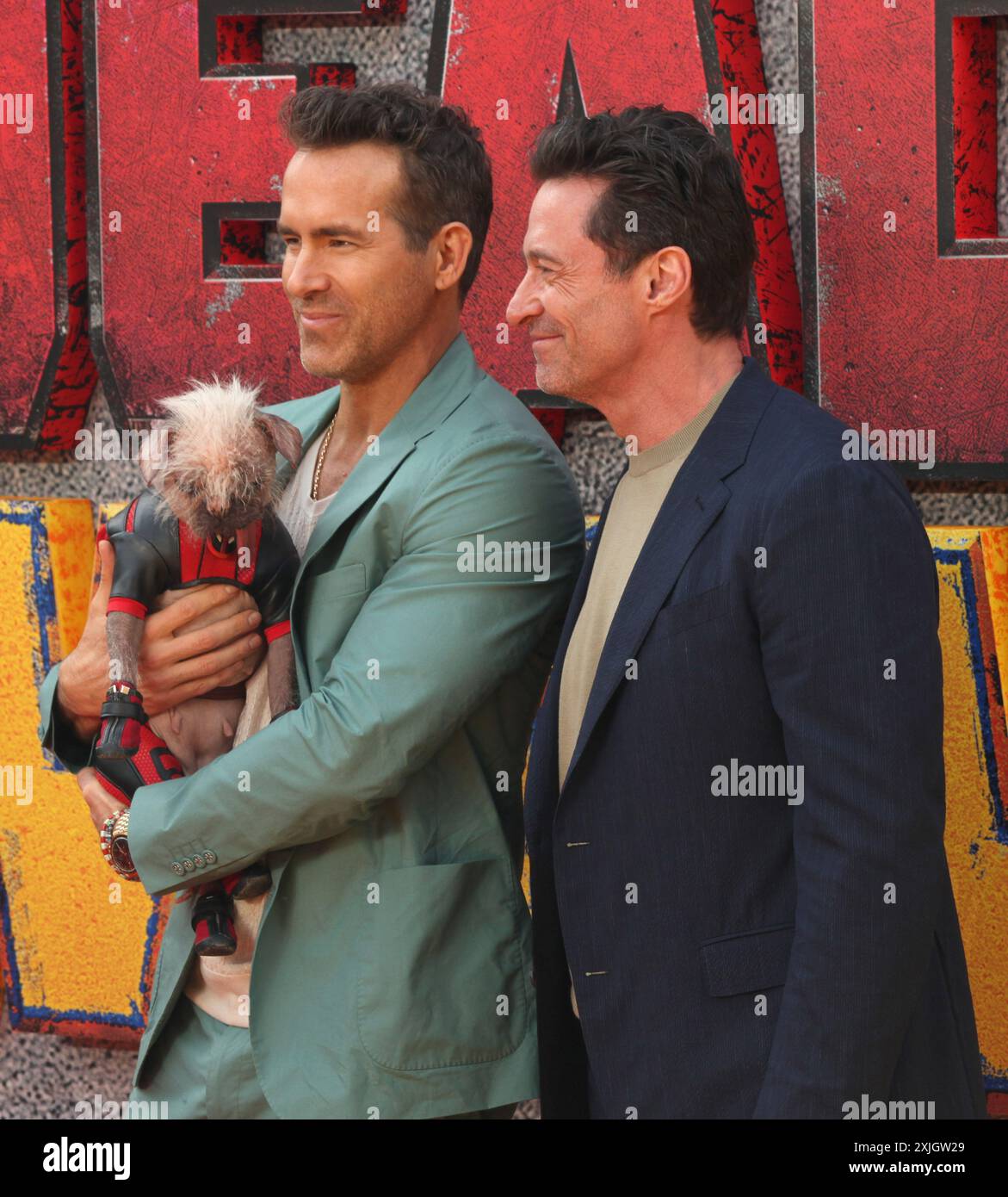 London, UK. Ryan Reynolds and Hugh Jackman with Peggy at the Deadpool ...