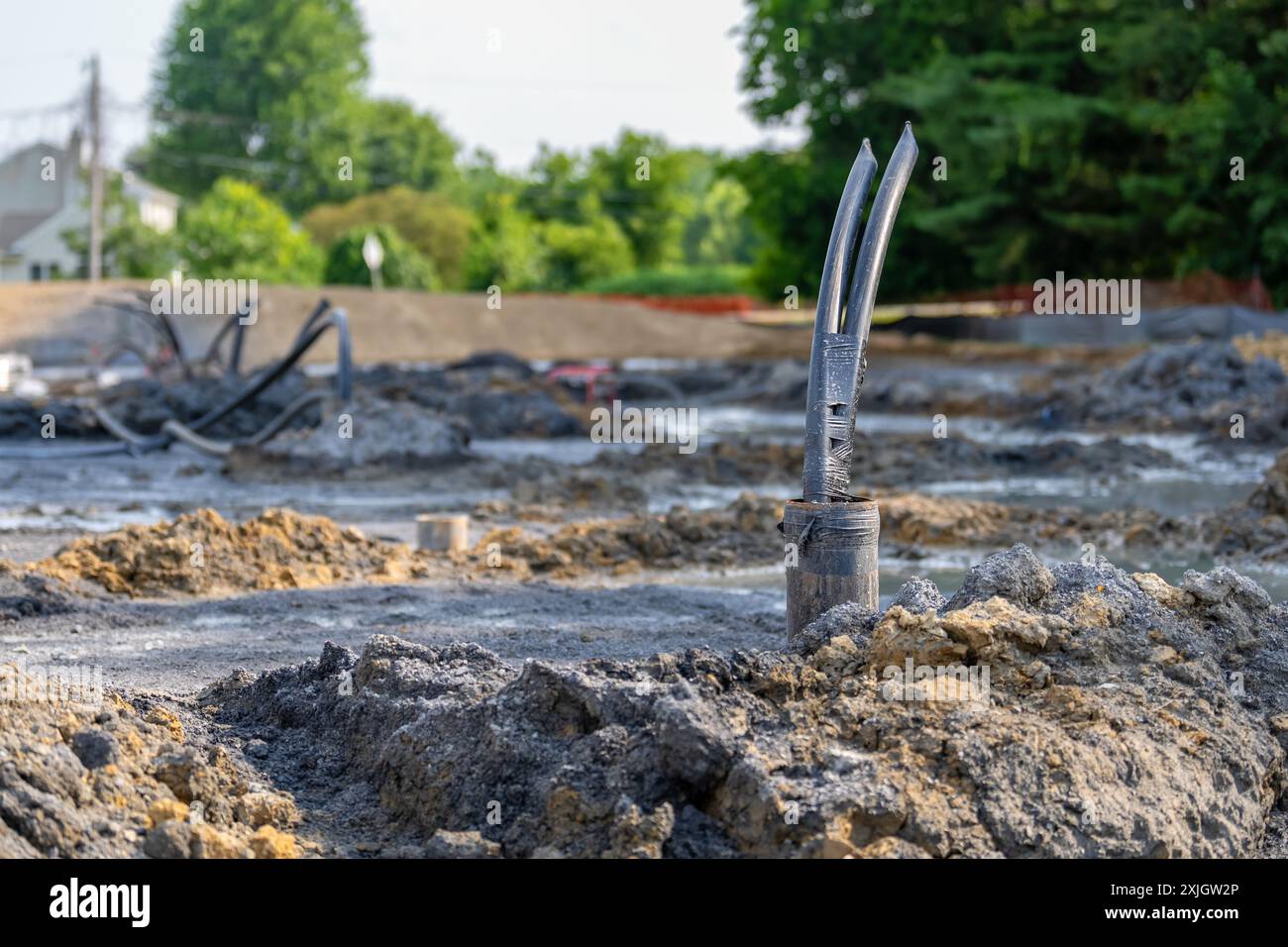Casing pipe with polyethylene ground loop pipes in the process of being ...