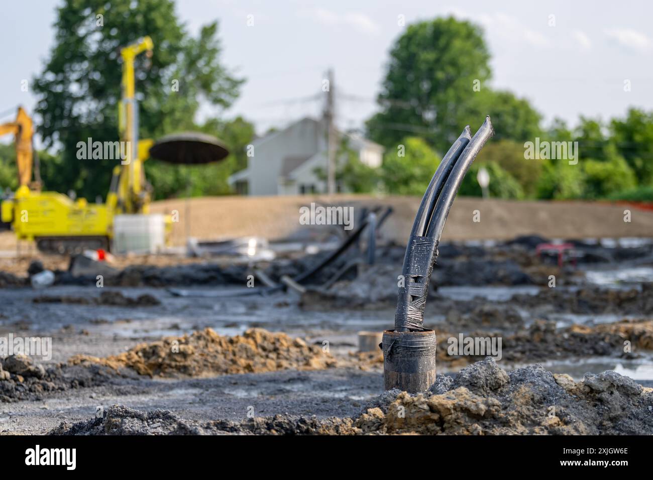 Casing pipe with polyethylene ground loop pipes in the process of being ...