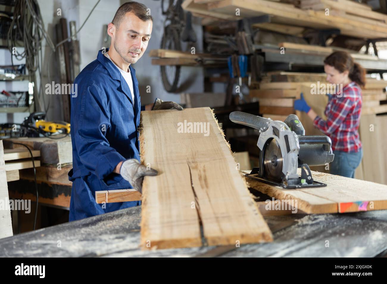 Male employee workshop cuts hi-res stock photography and images - Alamy
