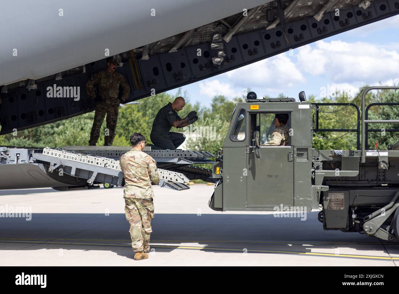 A crew member of a Heavy Airlift Wing (HAW) aircraft, a part of the ...