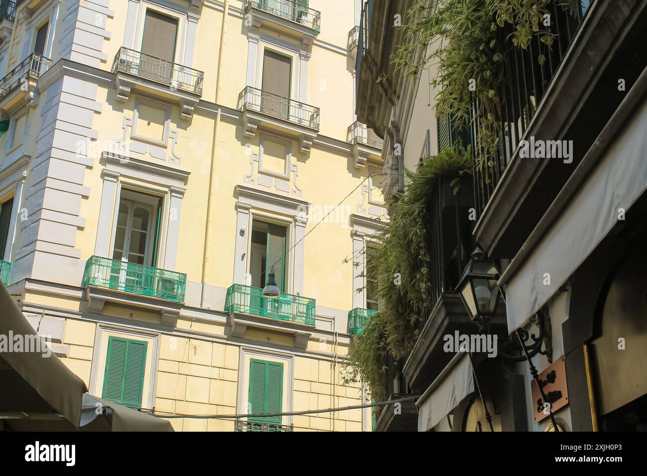 Bright orange and yellow buildings in the southern Italian city on the ...