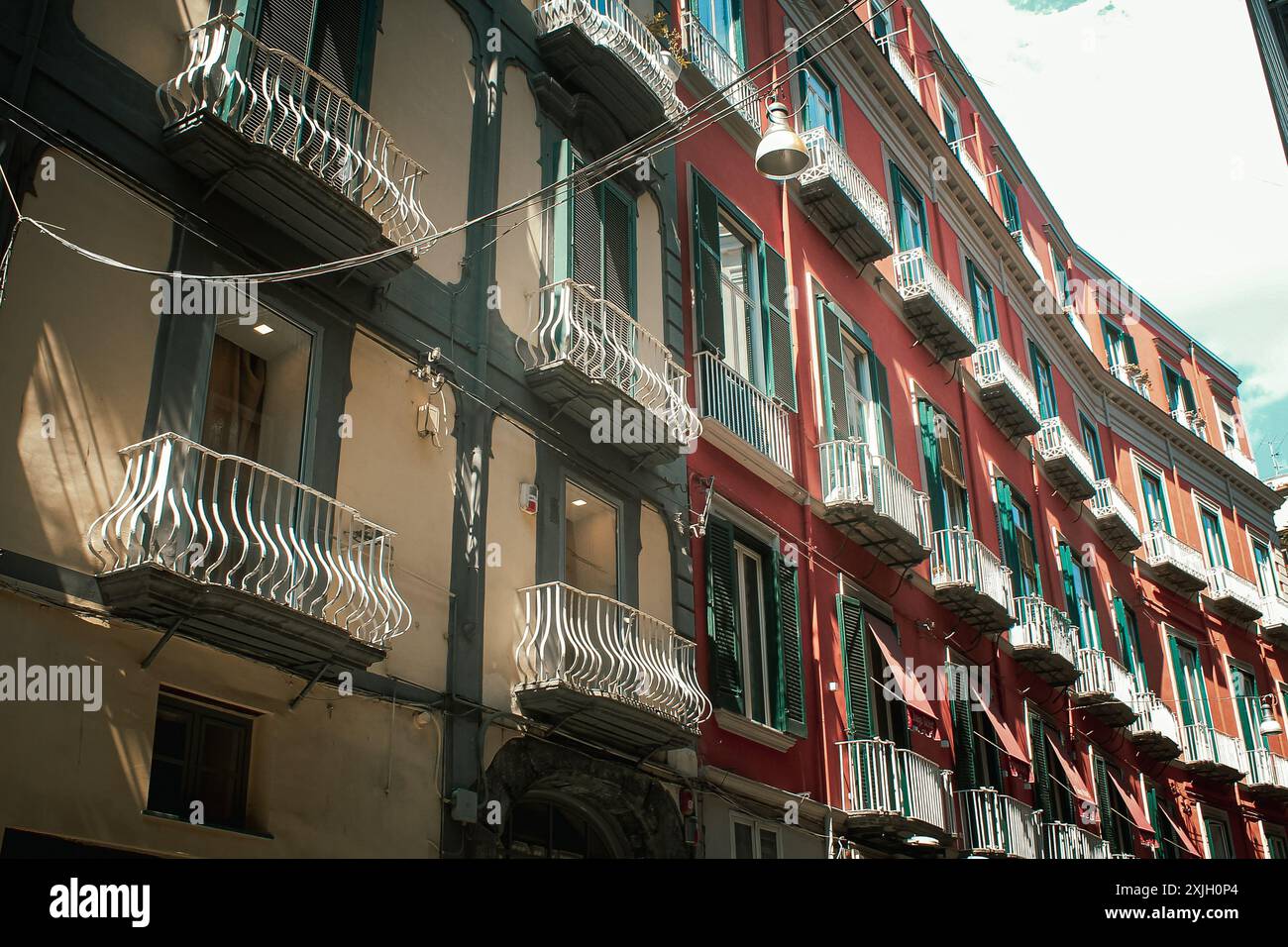 Bright red and yellow buildings in the southern Italian city on the ...