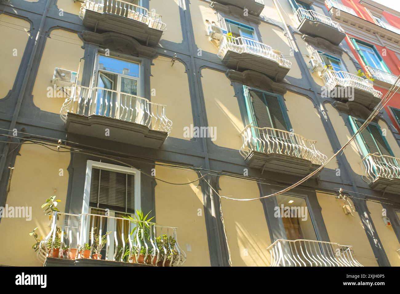 Bright orange and yellow buildings in the southern Italian city on the ...