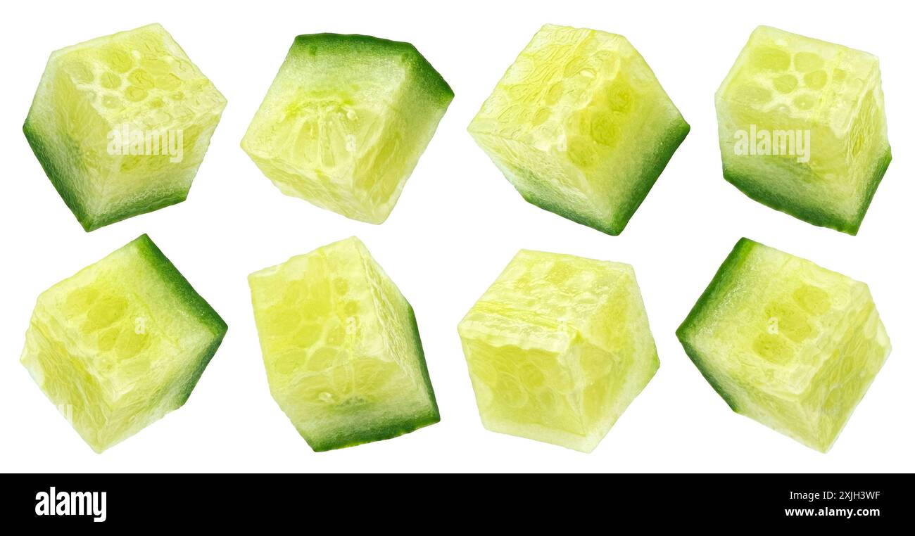 Falling cucumber cubes isolated on white background Stock Photo - Alamy