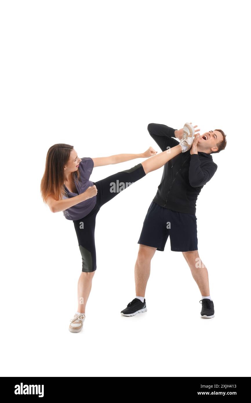 Students of self-defence course fighting on white background Stock ...