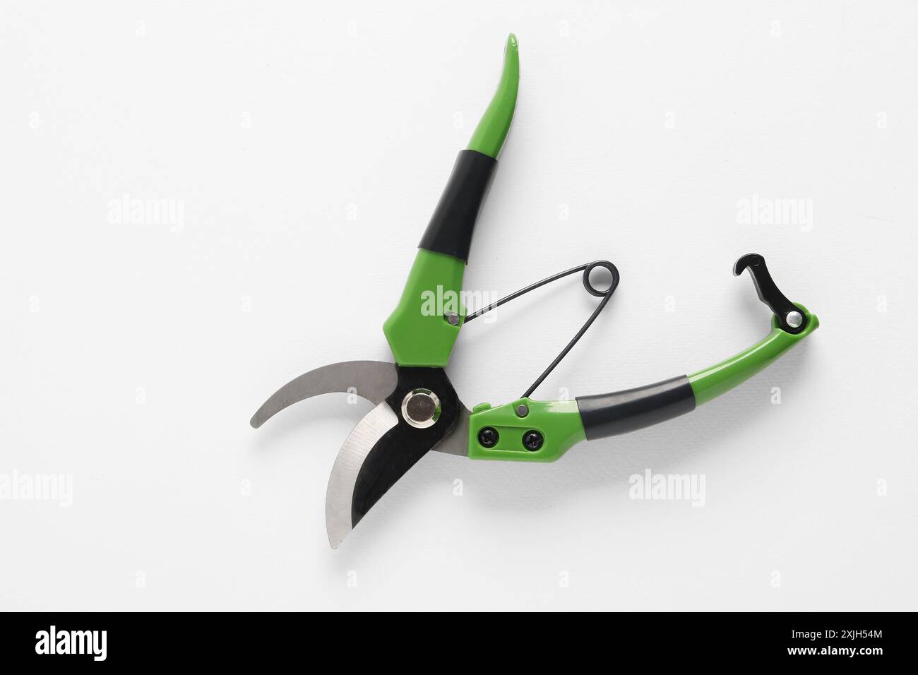 Gardening green secateurs on white background Stock Photo - Alamy