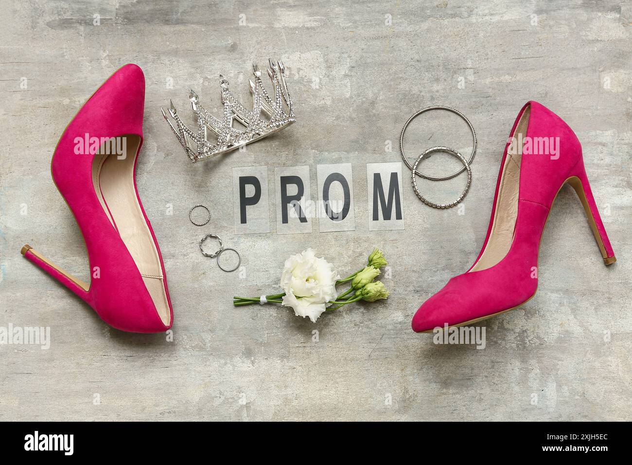 Word PROM with female shoes, crown and boutonniere on grey grunge ...