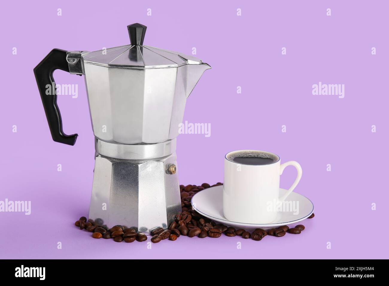 Geyser coffee maker with cup and beans on purple background Stock Photo ...