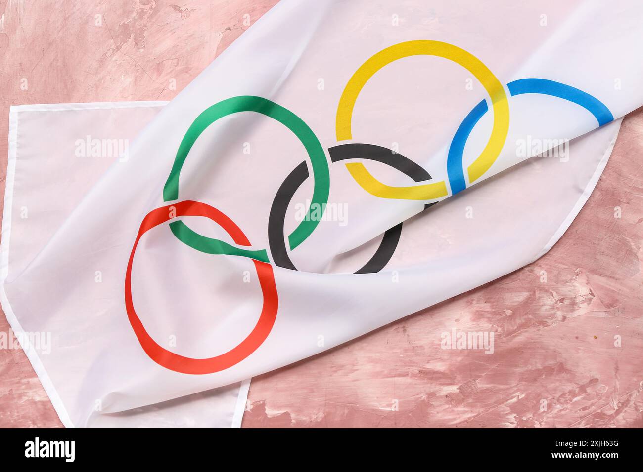 Olympic flag on pink background Stock Photo - Alamy