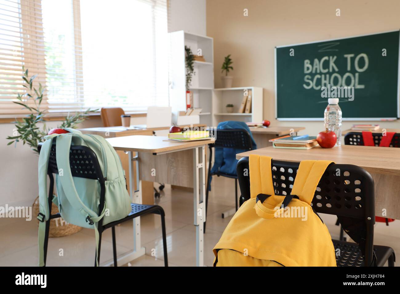 Hanging backpacks hi-res stock photography and images - Alamy