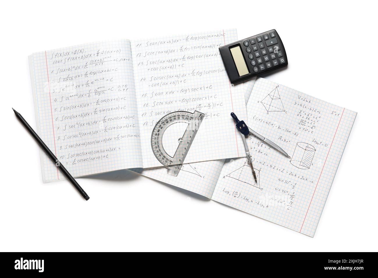 Copybook with handwritten maths formulas, calculator, pencil and ruler ...