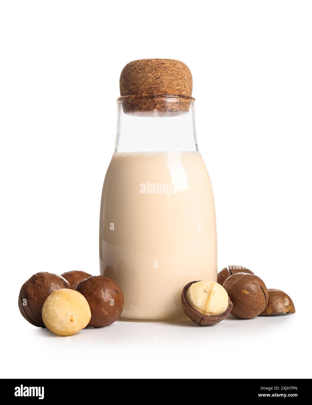 Bottle of fresh macadamia milk on white background Stock Photo - Alamy