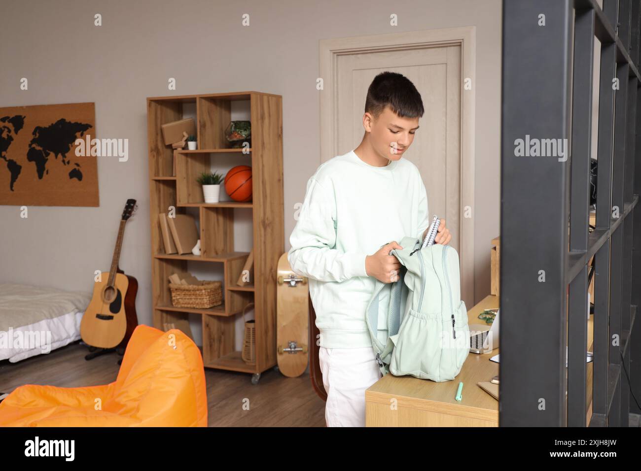 Boy packing hi-res stock photography and images - Alamy
