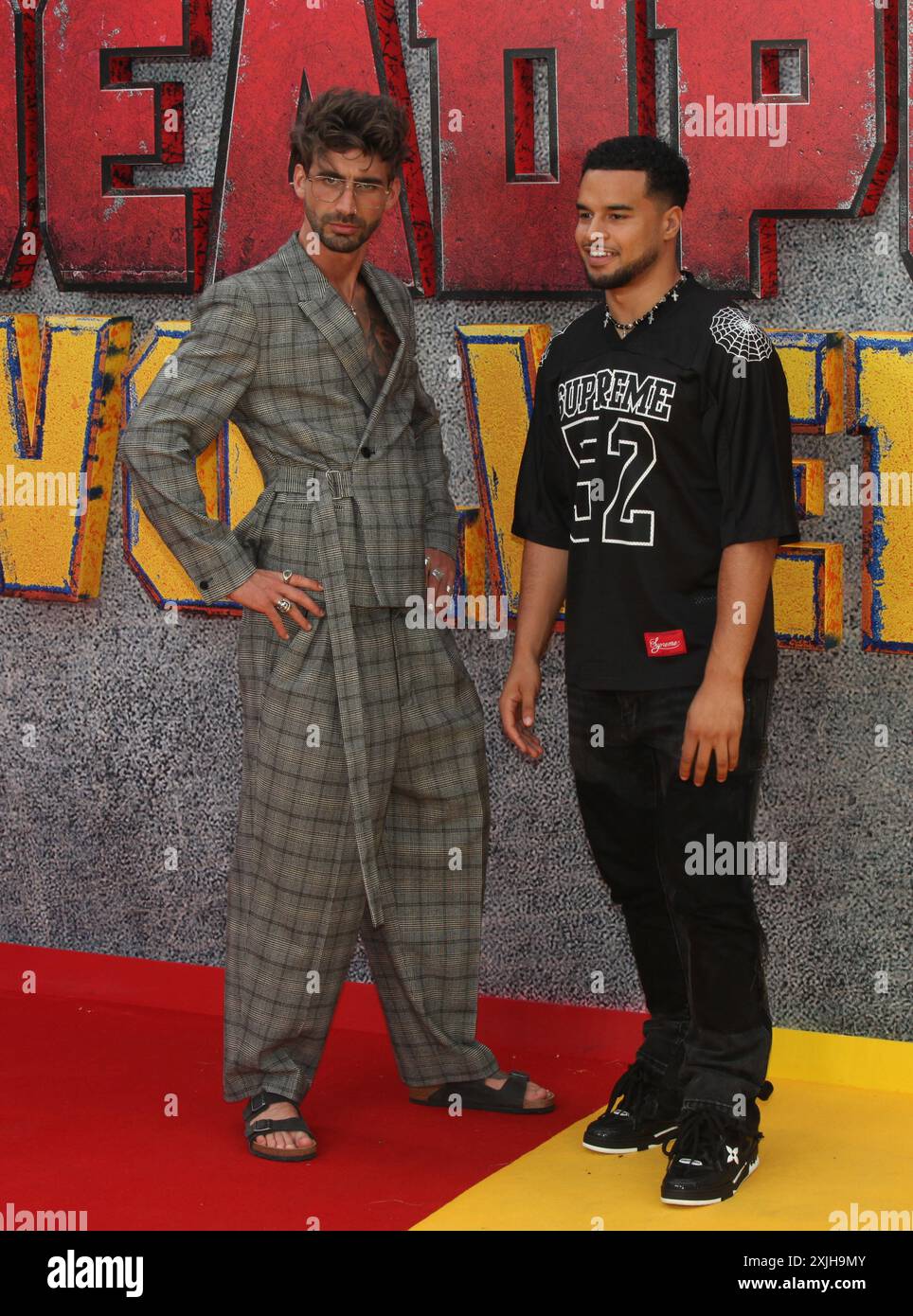 London, UK. Chris Taylor (left) and Toby Aromolaran at the Deadpool ...