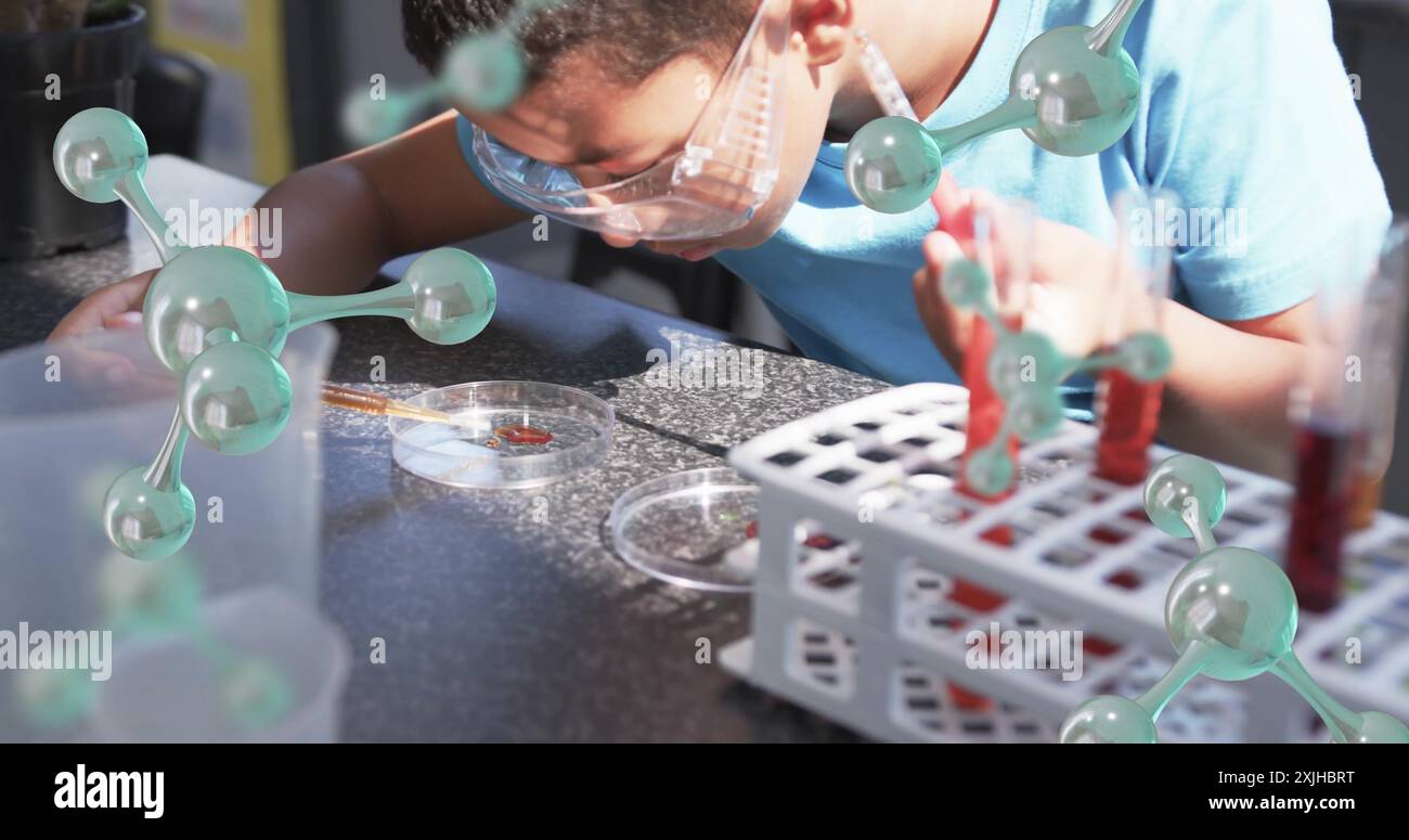Conducting science experiment, child in lab goggles with molecular structures image Stock Photo ...