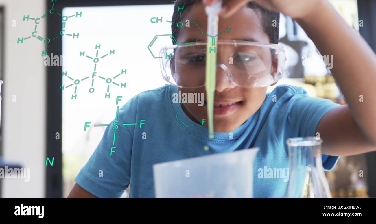 Conducting science experiment, child with safety goggles over chemical formulas image Stock ...
