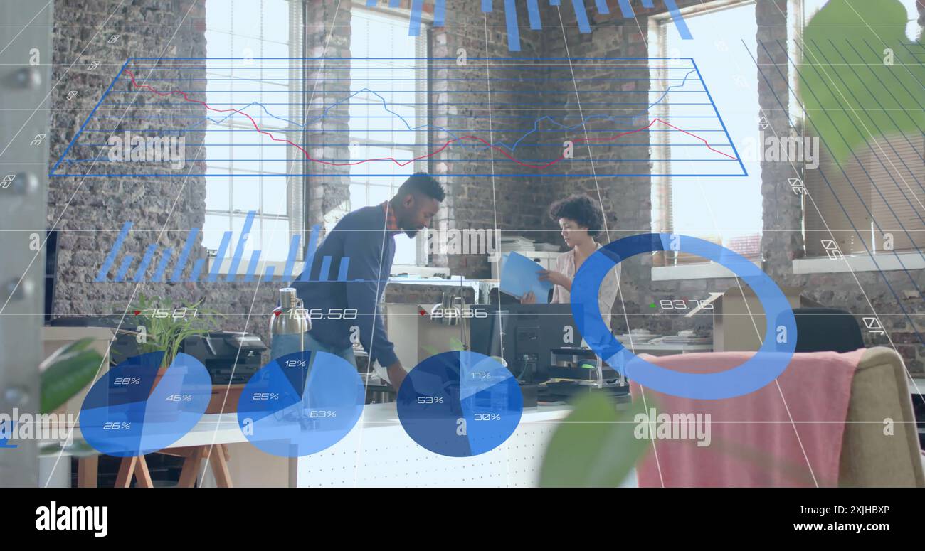 Image of charts processing data over diverse colleagues unpacking at ...