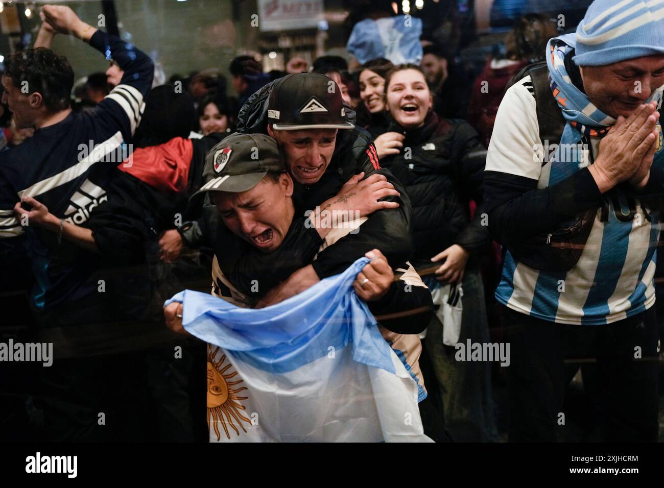 Soccer fans react in Buenos Aires, Argentina, early Monday, July 15, 2024, after Argentina ...