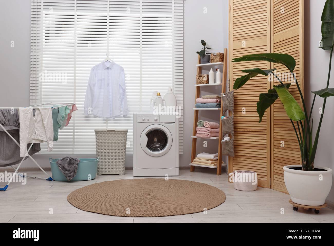 Device drying clothes in hi-res stock photography and images - Alamy