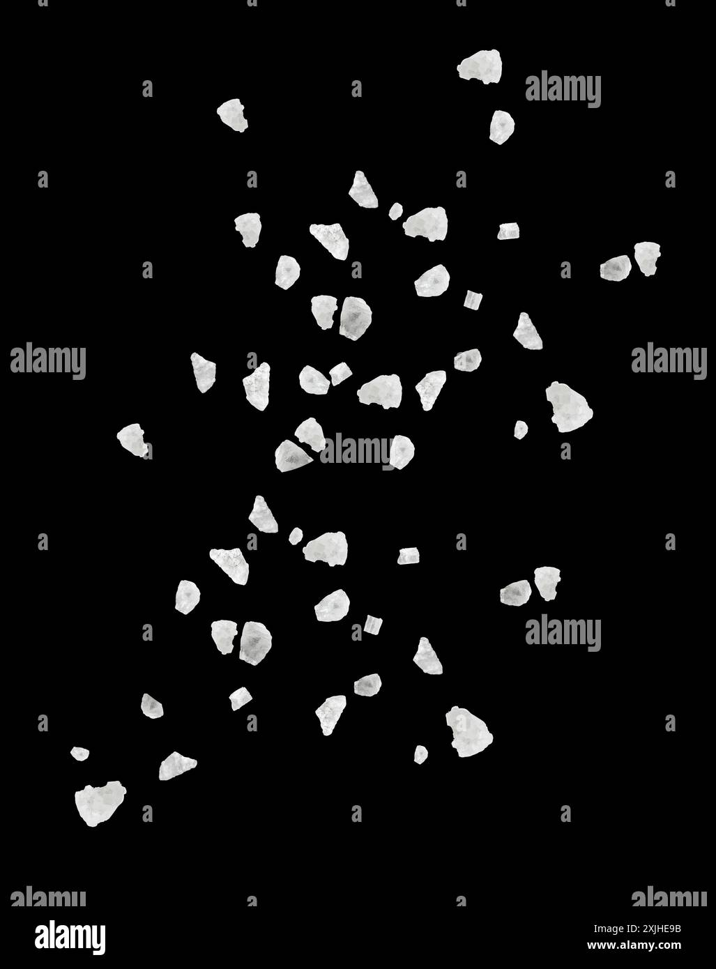 Sea salt grains in air on black background Stock Photo - Alamy