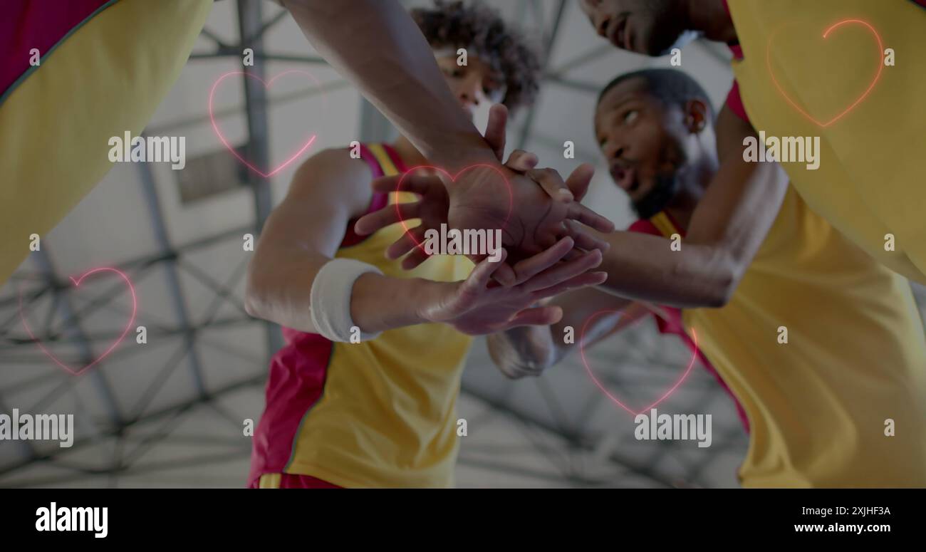 Image of hearts over diverse basketball players on court Stock Photo ...