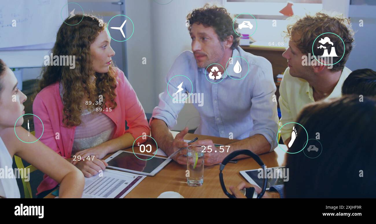 Image of ecology icons over diverse colleagues at meeting in office ...