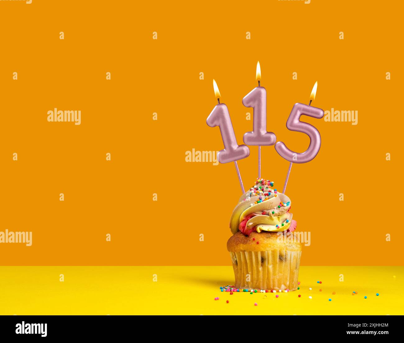 Birthday celebration with cupcake - Candle number 115 Stock Photo - Alamy