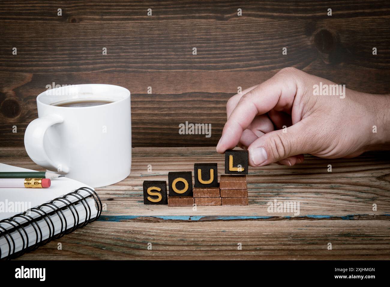 SOUL. Old letter tiles on wooden steps, development concept Stock Photo ...