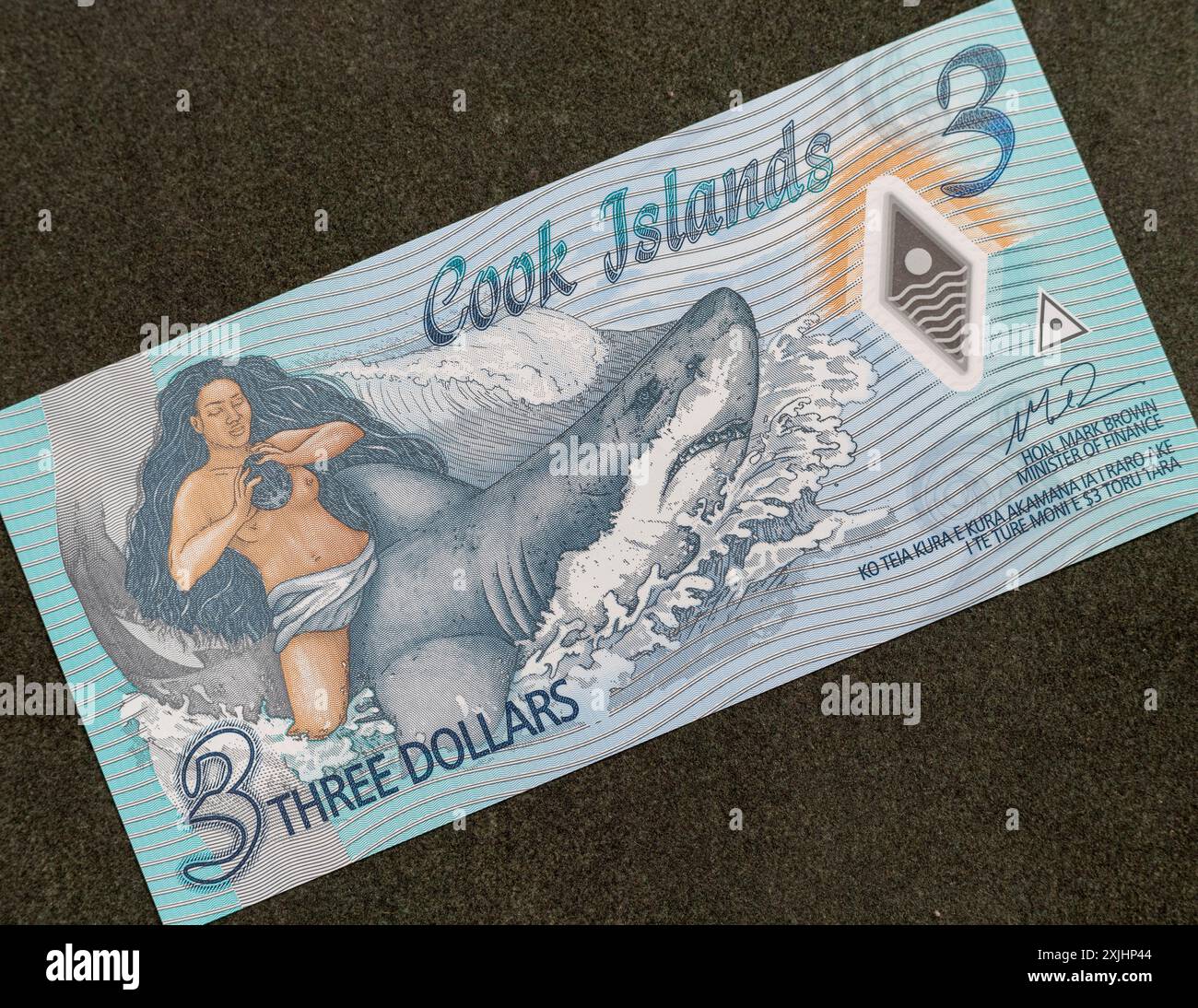 Angled view of a Cook Islands 3 dollar bill front side Stock Photo - Alamy