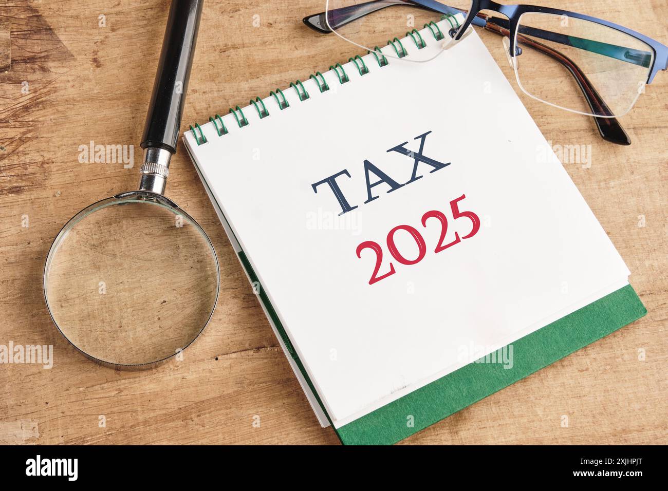 Conceptual tax 2025 symbol. Copy space. Tax 2025 words written on a ...