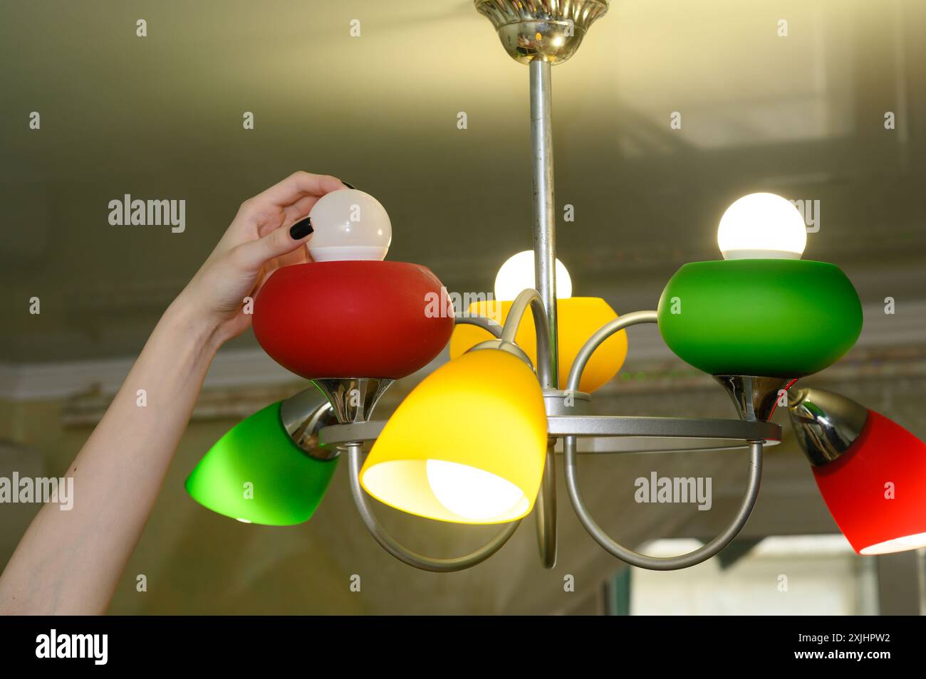 Girl holding led bulb hi-res stock photography and images - Alamy