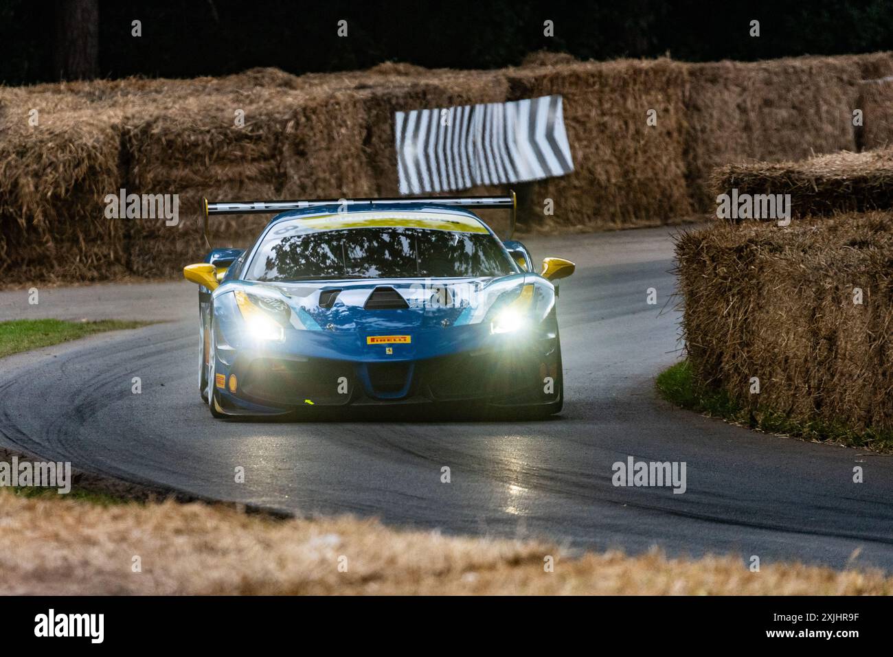 2019 Ferrari 488 Challenge Evo race car driving up the hill climb track ...