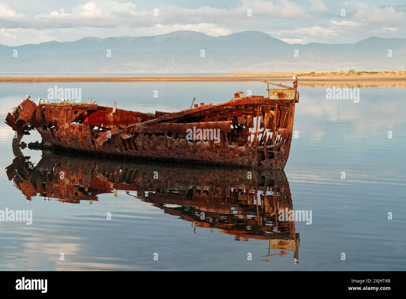 Janie Seddon shipwreck reflected in the high tide, Motueka, Tasman ...