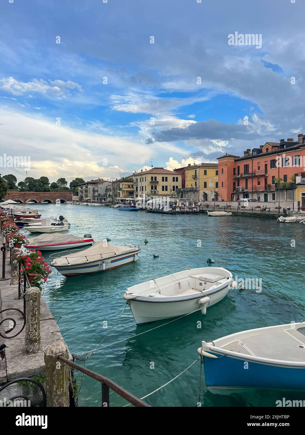 Sunset view of main canal in Italian town Peschiera del Garda Stock ...