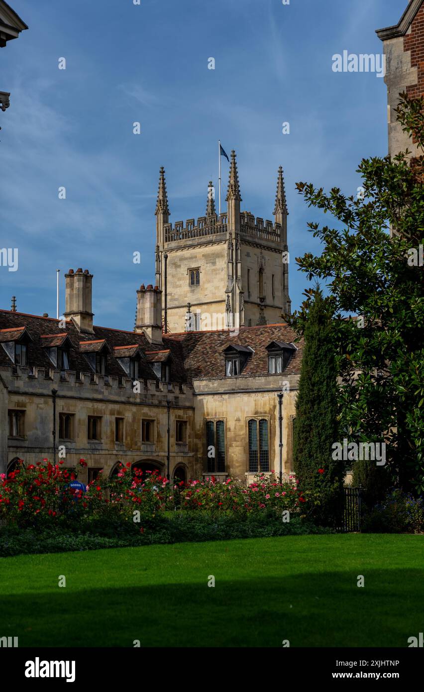 Cambridge, UK - October 08, 2023 : A tall stone tower with a flagpole ...