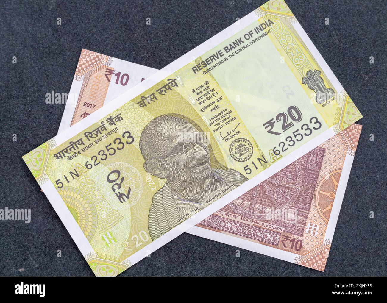 Mahatma Gandhi portrait on indian ten and twenty currency banknotes ...