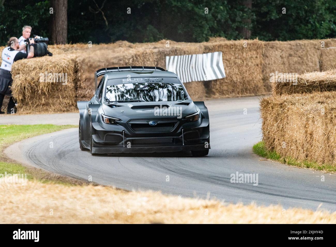 2024 Subaru WRX 'Airslayer' 'Project Midnight' racing car driving up the hill climb track at the ...