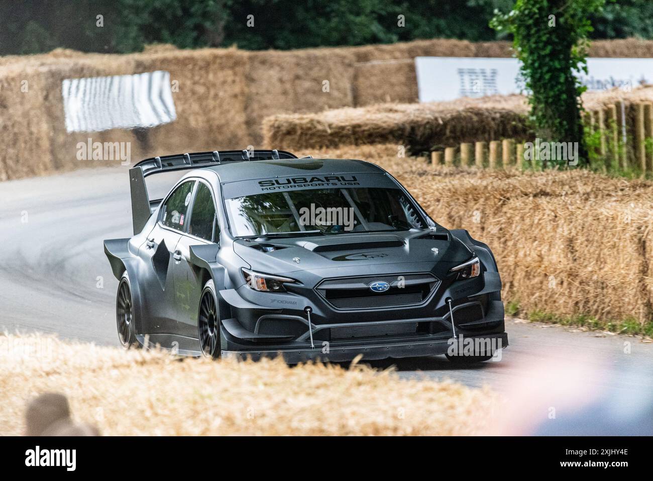 2024 Subaru WRX 'Airslayer' 'Project Midnight' racing car driving up the hill climb track at the ...