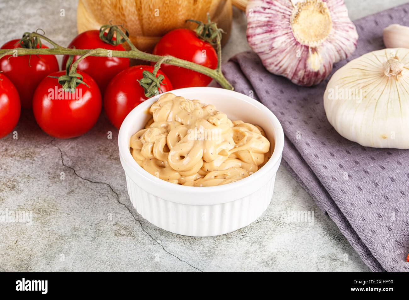 Bowl of Yellow cream grill sauce for burger Stock Photo - Alamy