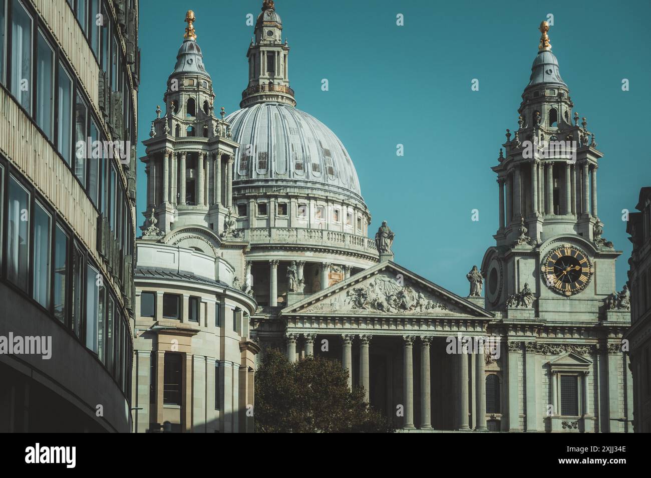 An impressive architectural structure with a large dome and clock tower ...