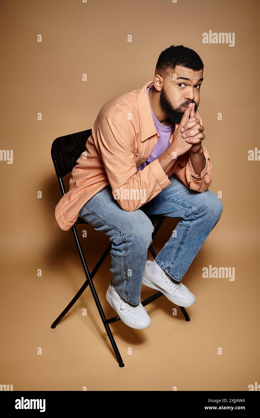 Man in chair hi-res stock photography and images - Alamy