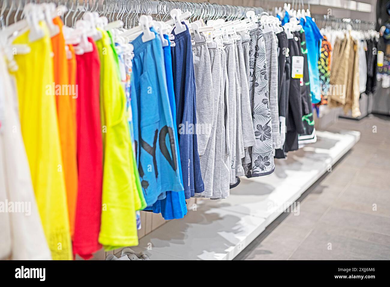 sportswear on a hanger in a sports store. Healthy lifestyle Stock Photo ...