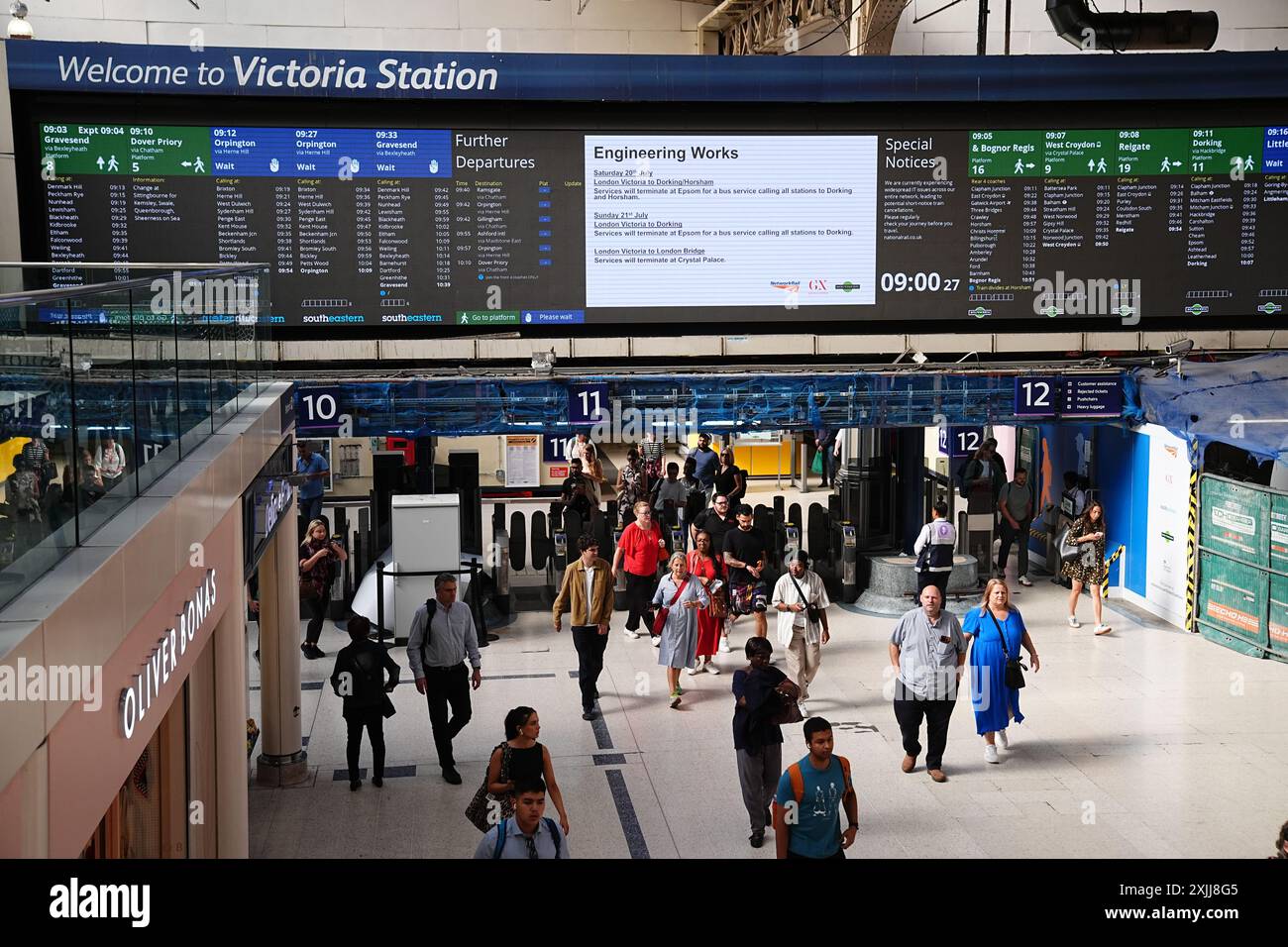 Passengers at Victoria train station, London, amid reports of ...