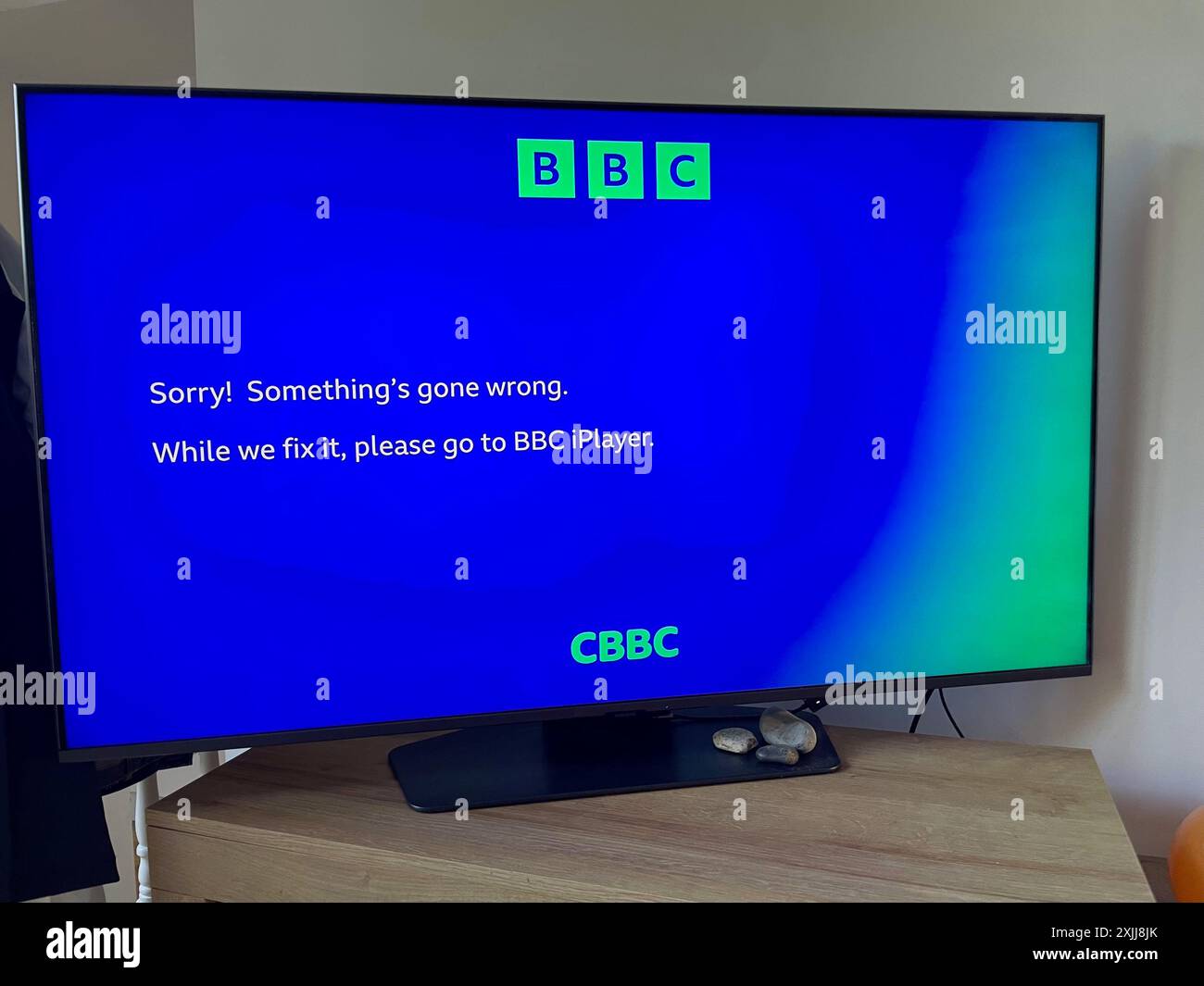 CBBC homepage on a television screen; Microsoft outage linked to cyber ...