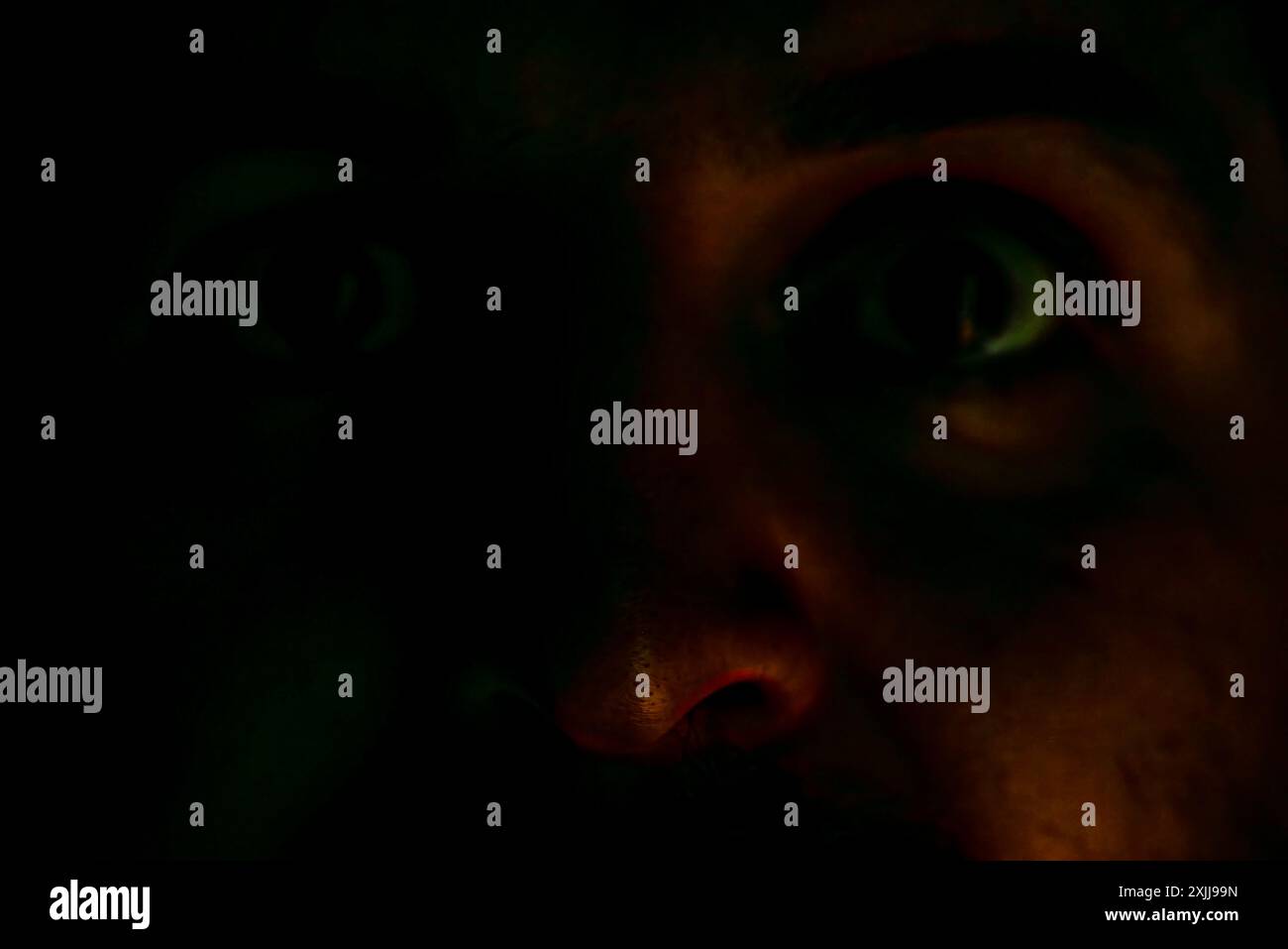 A dark and creepy photo capturing the eerie and unsettling expression ...