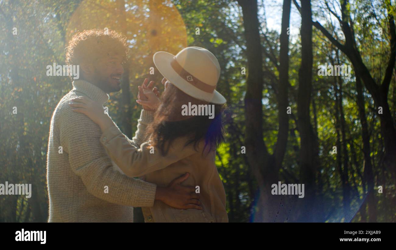Romantic date multiethnic couple spinning hi-res stock photography and ...