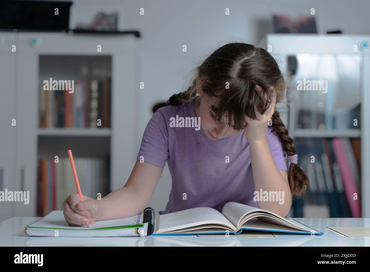 Girl homework schoolgirl hi-res stock photography and images - Alamy