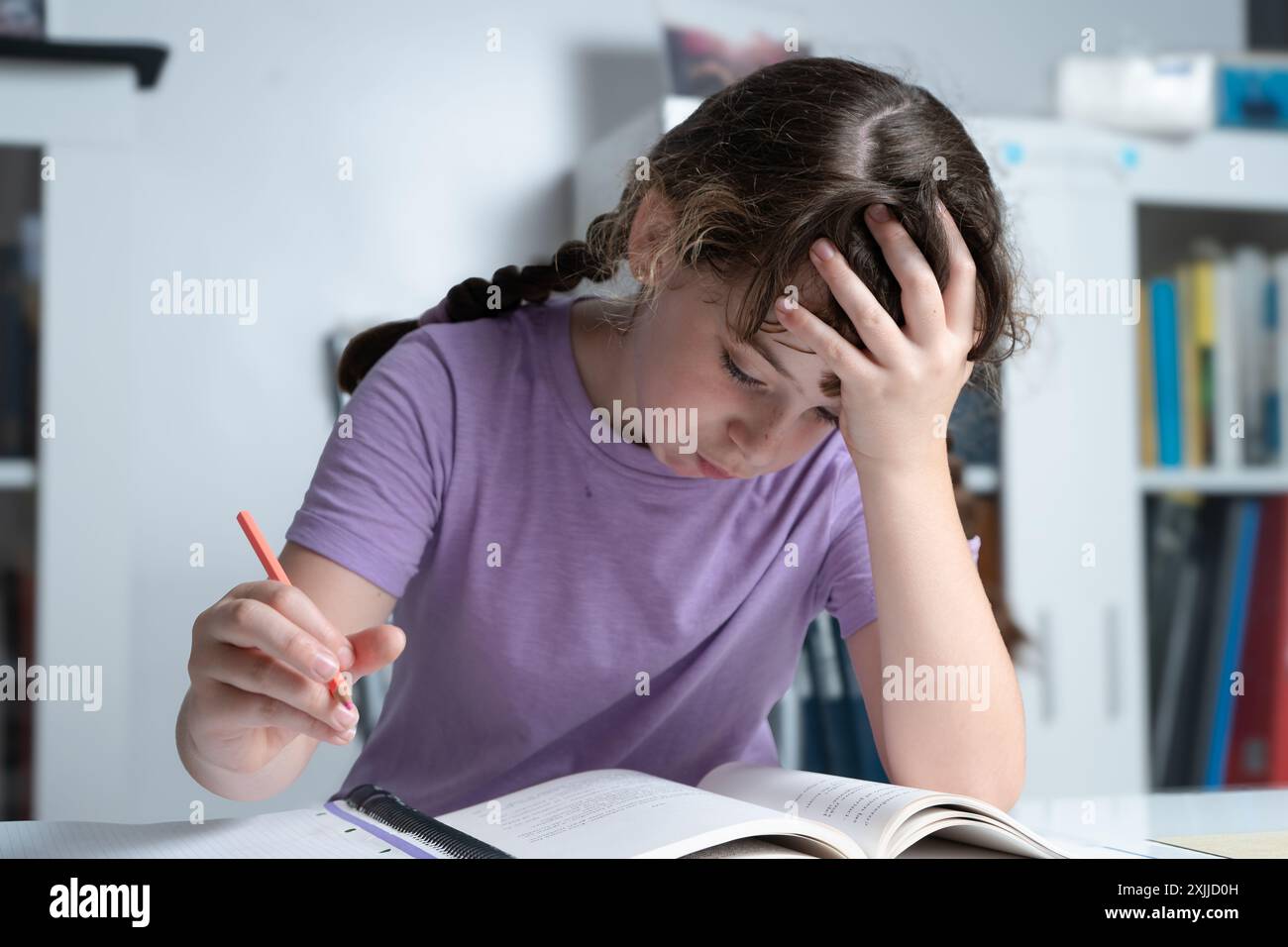 Girl homework schoolgirl hi-res stock photography and images - Alamy