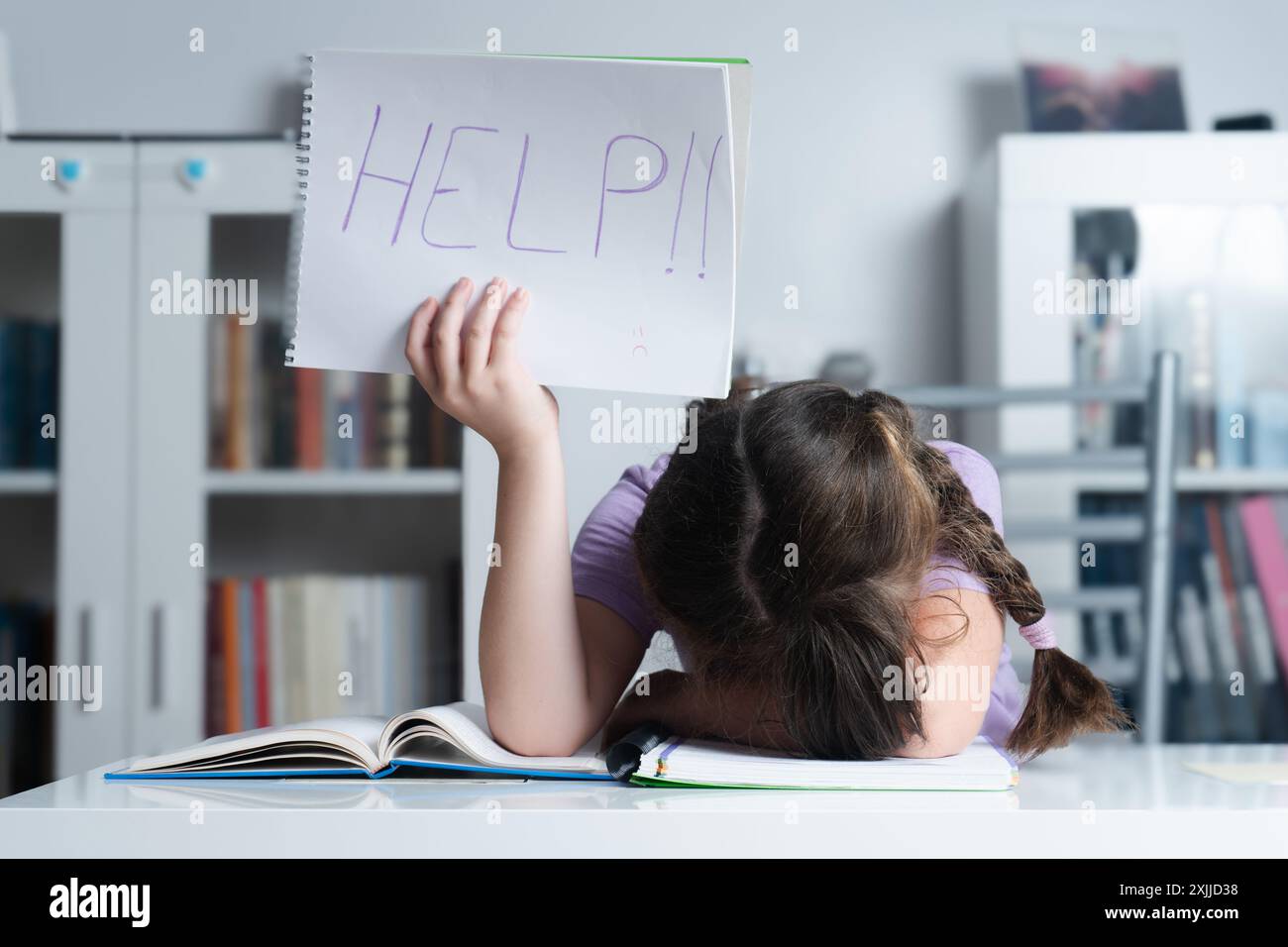 girl studying and asking for help Stock Photo - Alamy